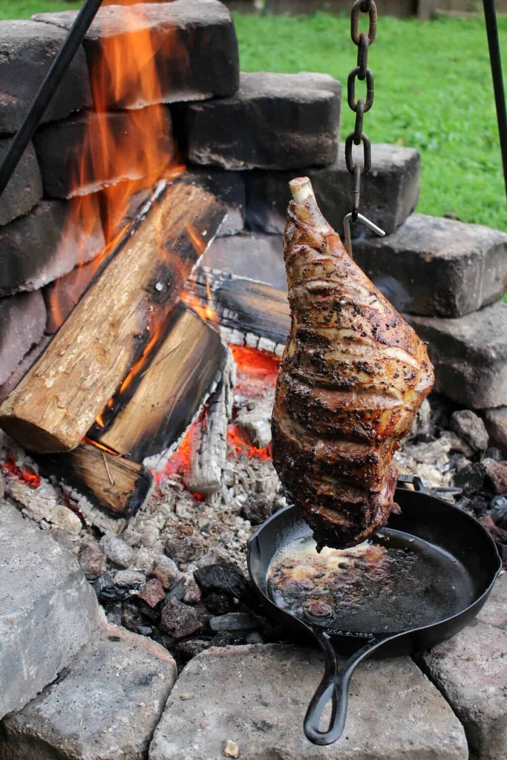 Herb Marinated Hanging Leg of Lamb - Over The Fire Cooking