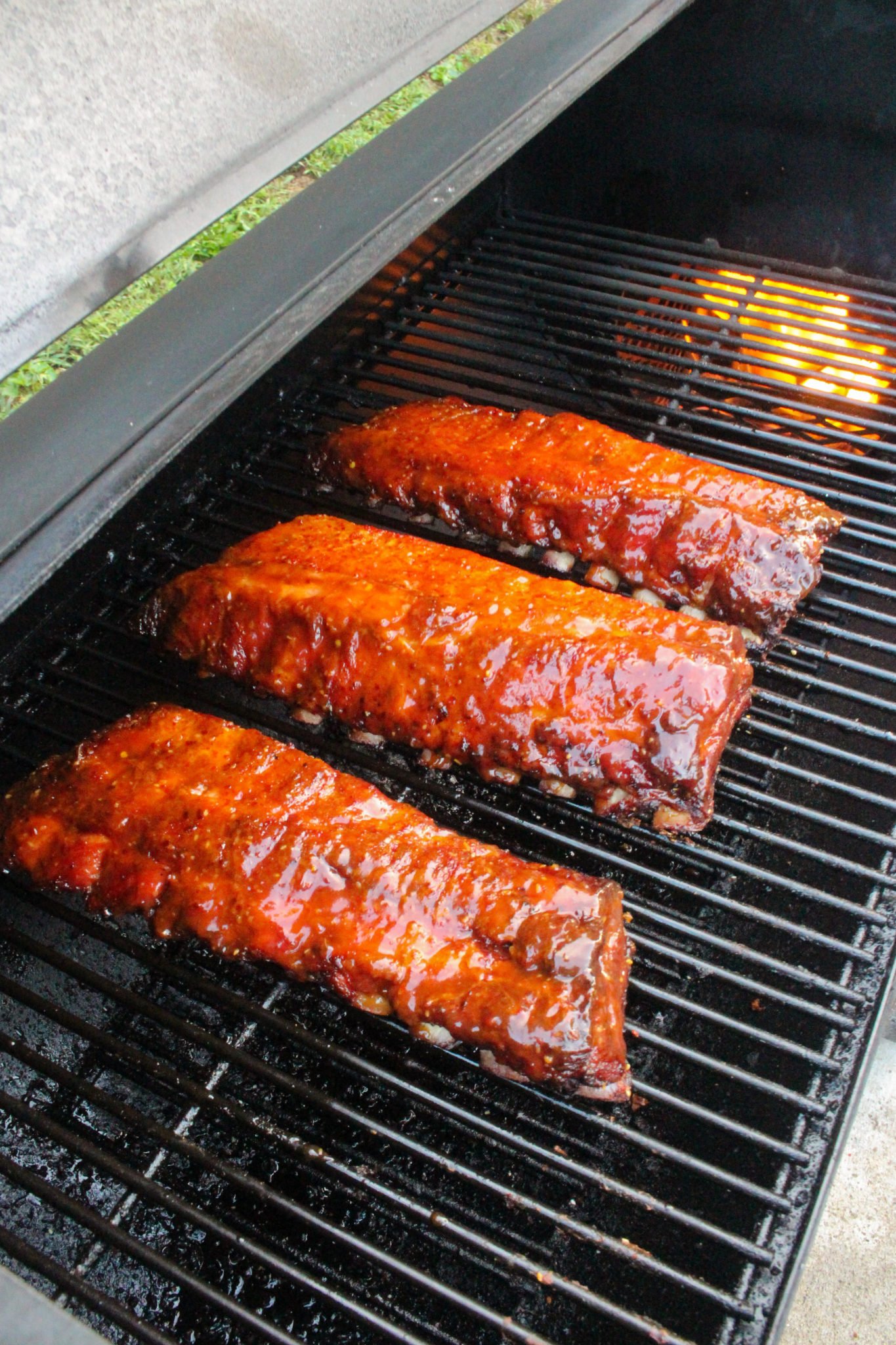 Sweet Teriyaki Sake Smoked Ribs - Over The Fire Cooking