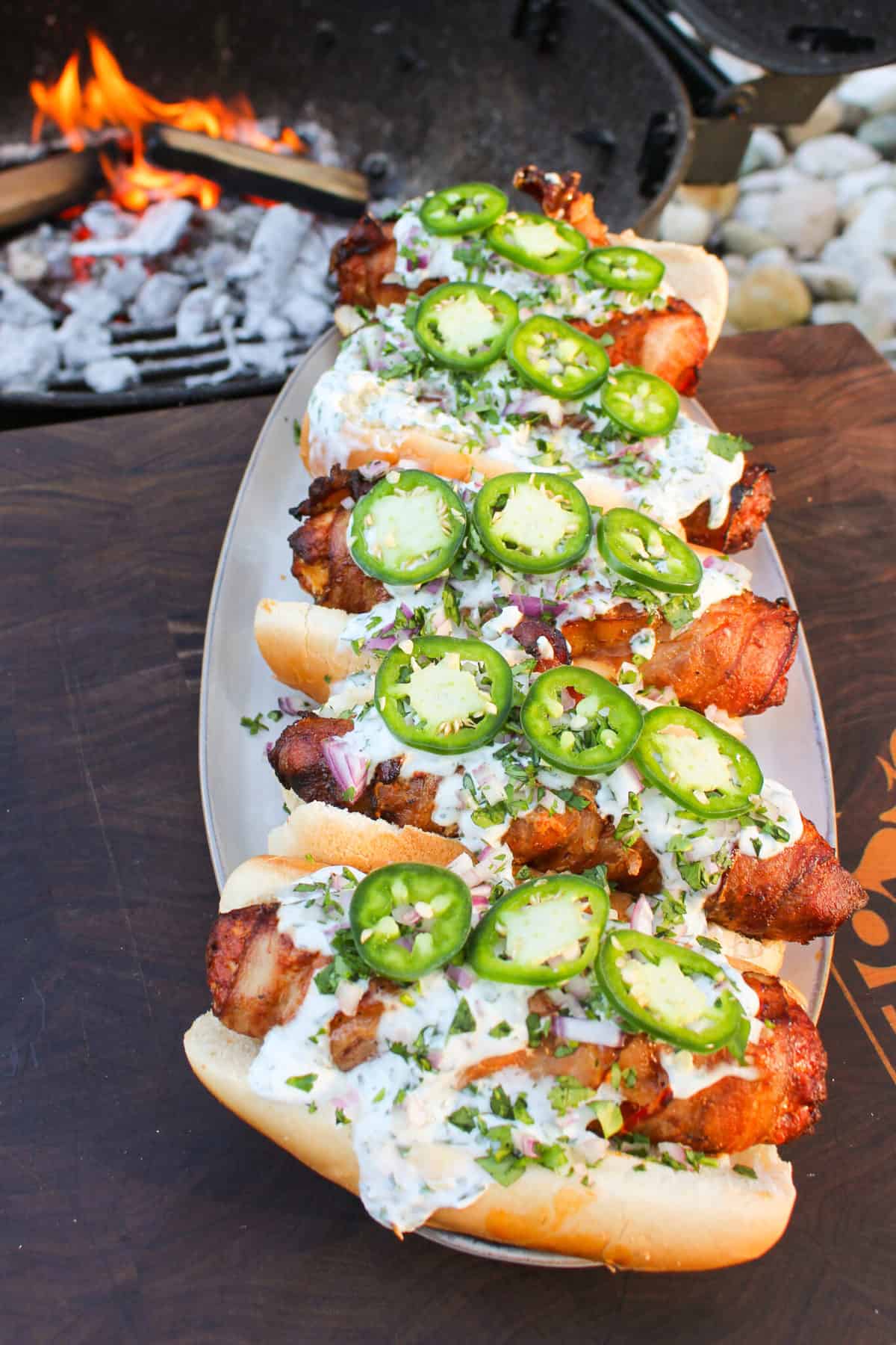 Bacon Wrapped Chorizo Dogs - Over The Fire Cooking